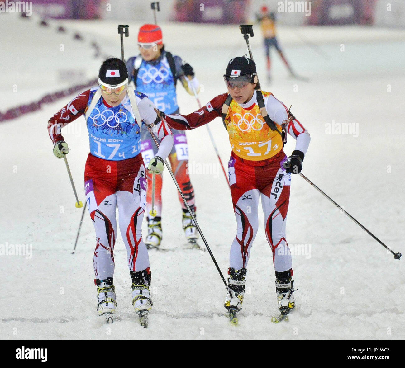 SOCHI, Russia - Japan's third runner Miki Kobayashi (R) tags anchor ...
