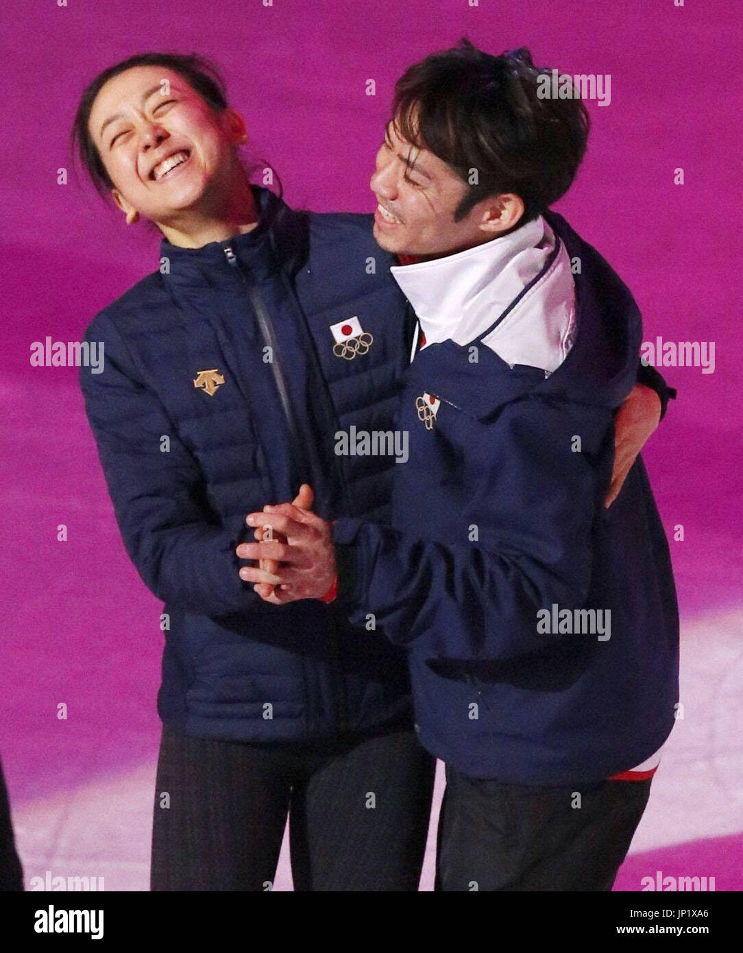 SOCHI, Russia - Japanese figure skaters Mao Asada (L) and Daisuke Takahashi are all smiles as ...