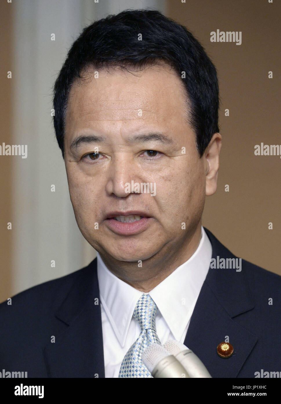 SINGAPORE, Singapore - CORRECTING TIME Akira Amari, Japan's minister in ...