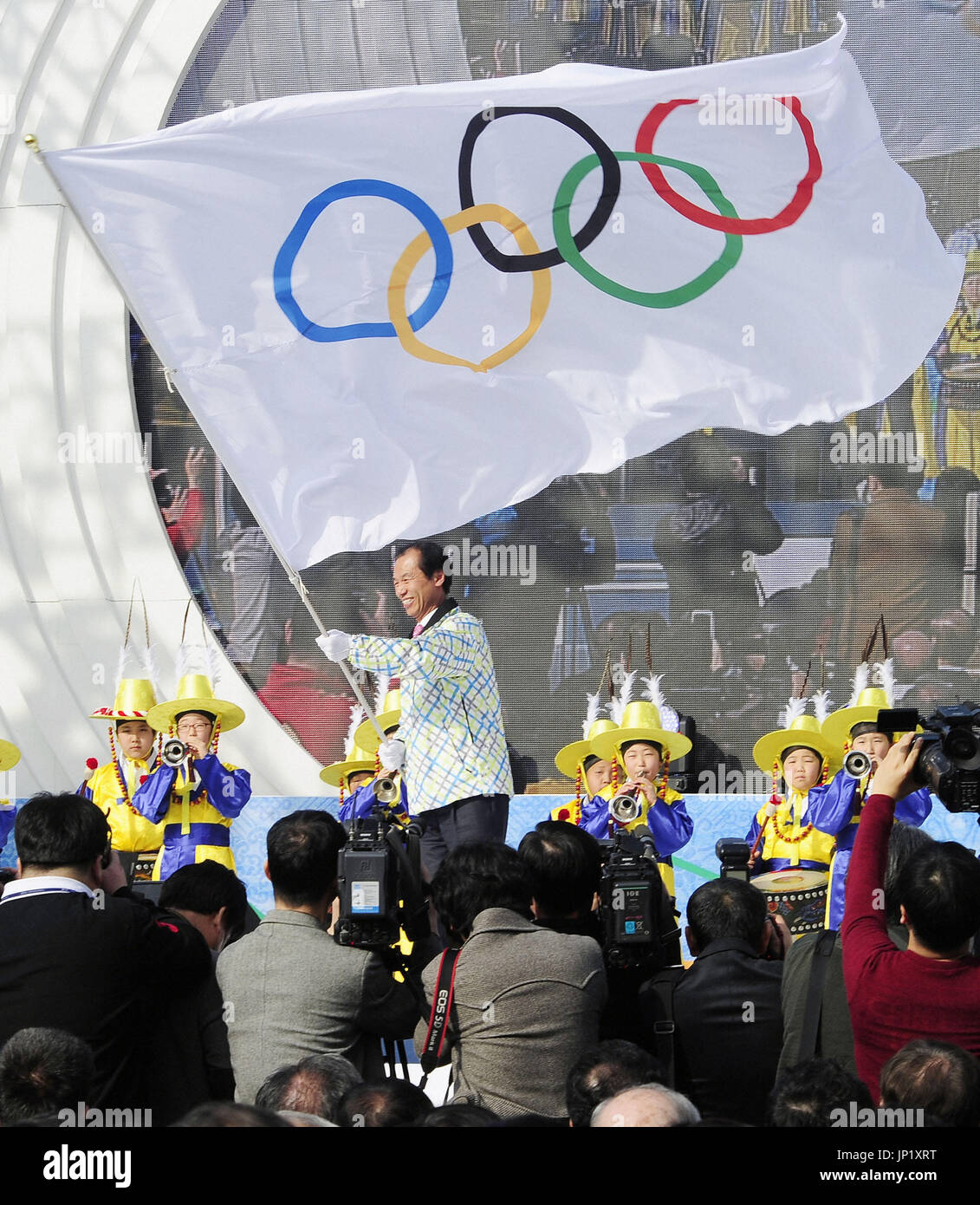 CHUNCHEON, South Korea - Gangwan Province Gov. Choi Moon Soon waves the ...