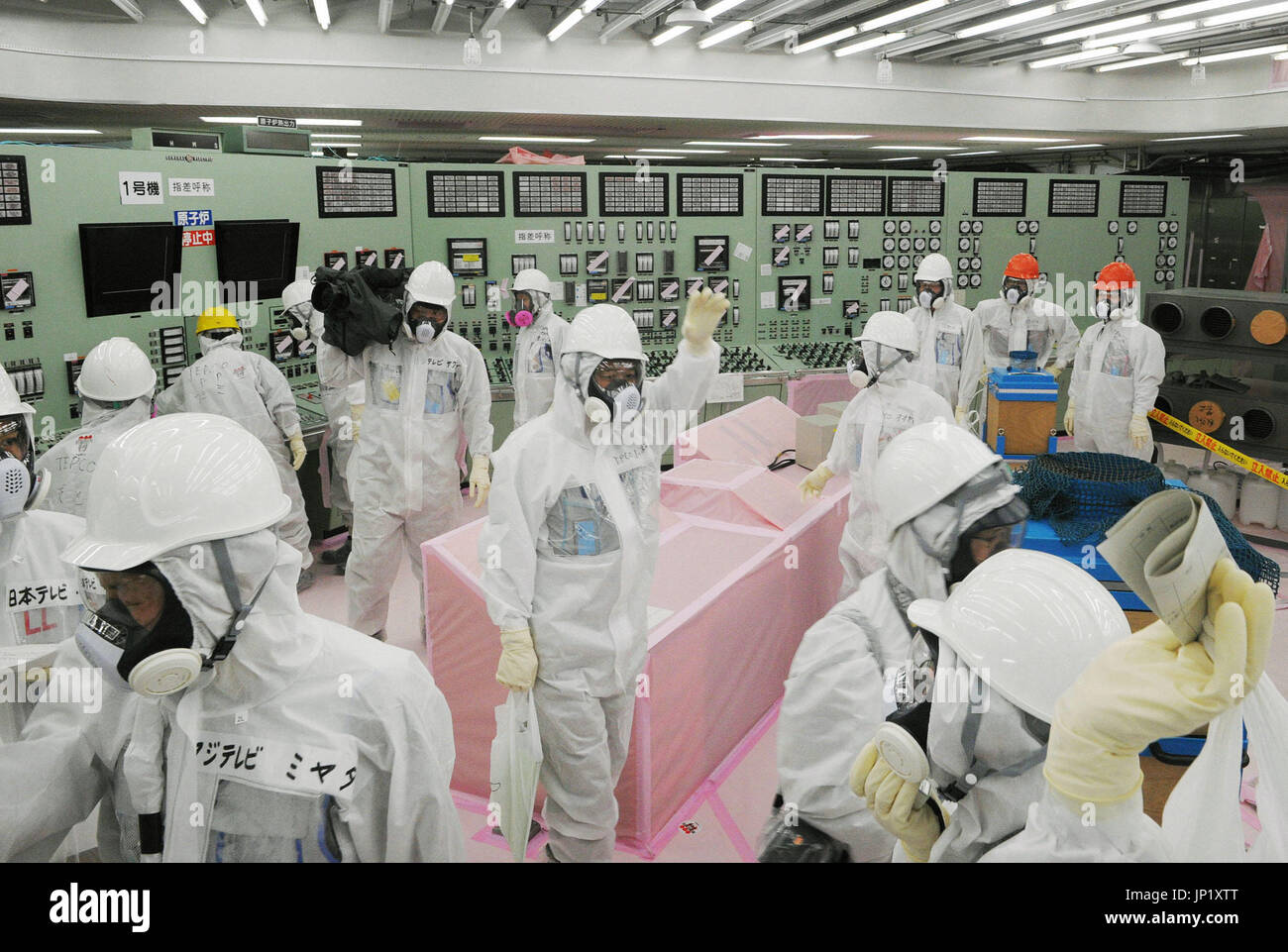TOKYO, Japan - Media are given access to the central control room of ...