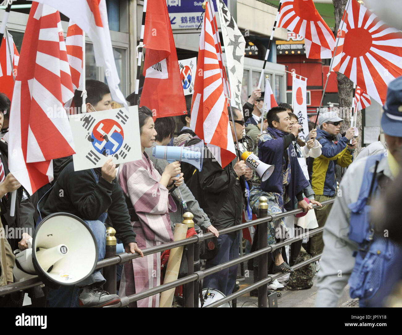 OSAKA, Japan - Members of an ultra right-wing group demonstrate in ...