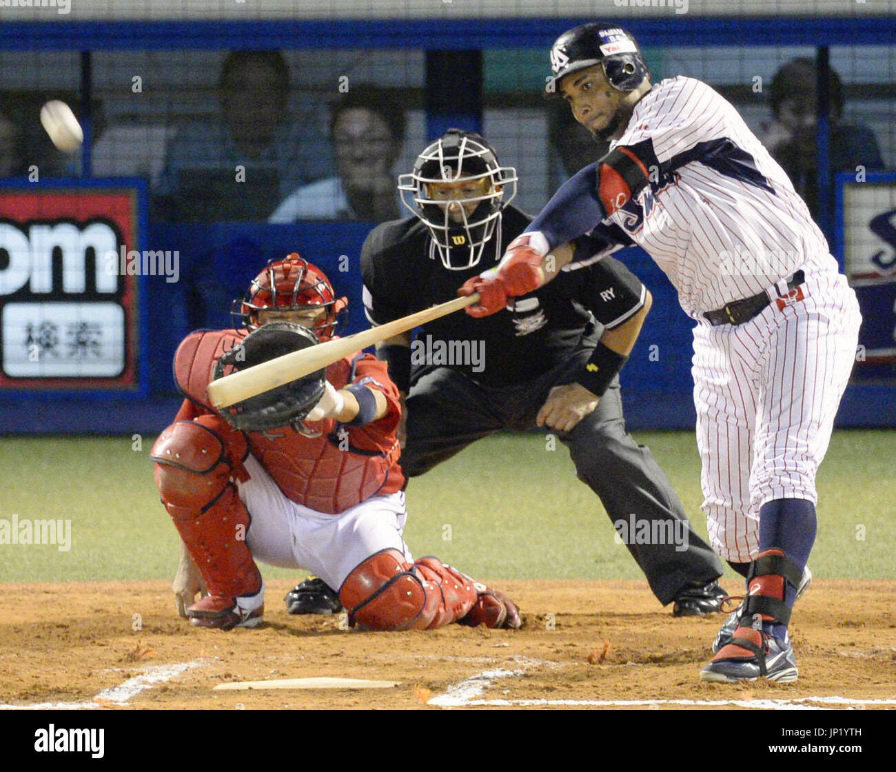 TOKYO, Japan - Wladimir Balentien of the Yakult Swallows homers during ...
