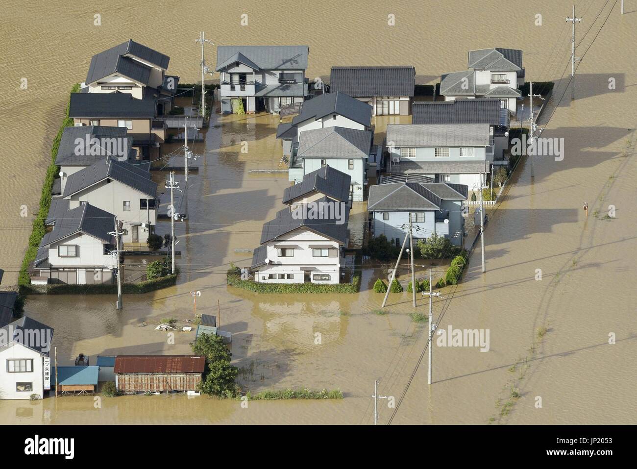 OBAMA, Japan - Photo taken from a Kyodo News helicopter shows a flooded ...