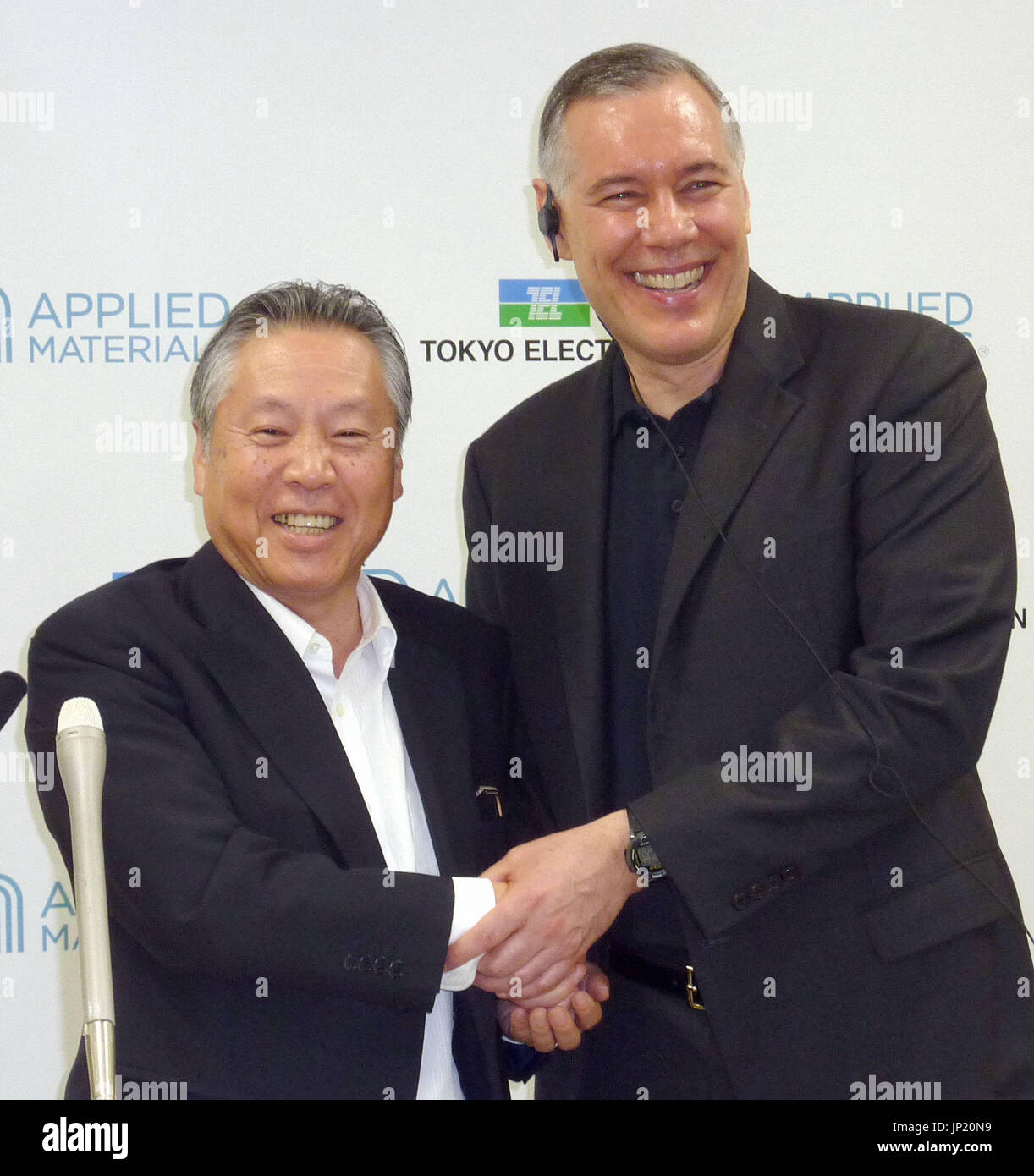 TOKYO, Japan - Tetsuro Higashi (L), chairman and president of ...