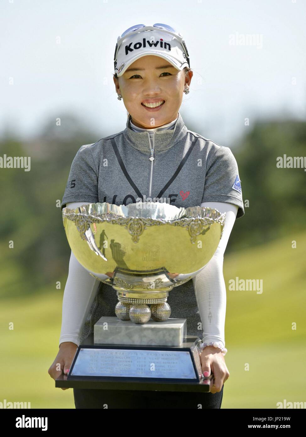 SENDAI, Japan - South Korea's Lee Na Ri holds the victor's trophy after ...