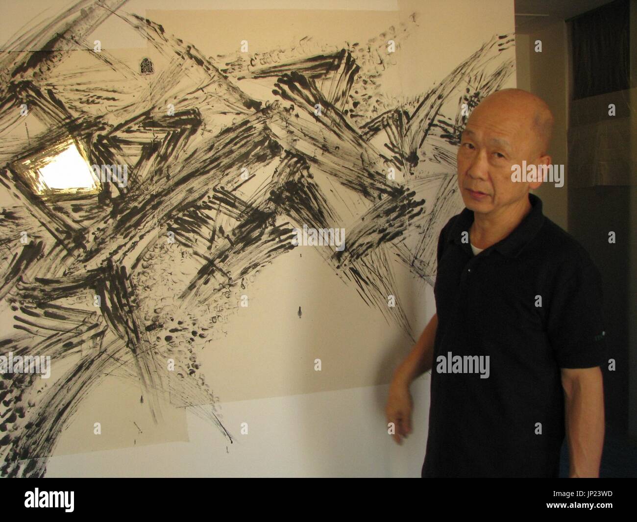 TOKYO, Japan - Artist Naoki Takenouchi explains about his artwork in a ...
