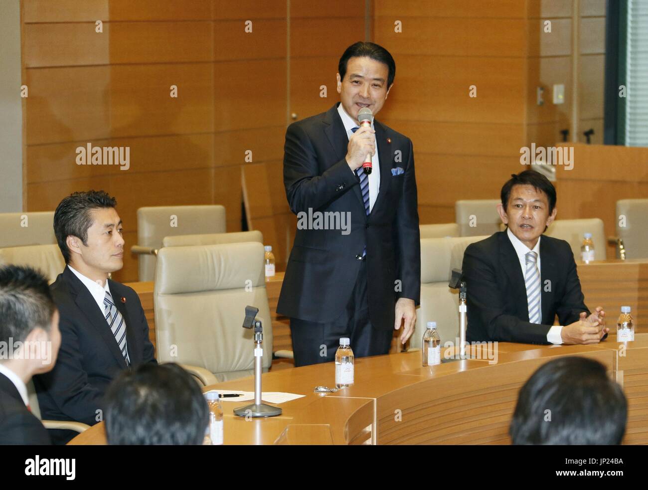 TOKYO, Japan - Kenji Eda (standing), who quit the opposition Your Party ...