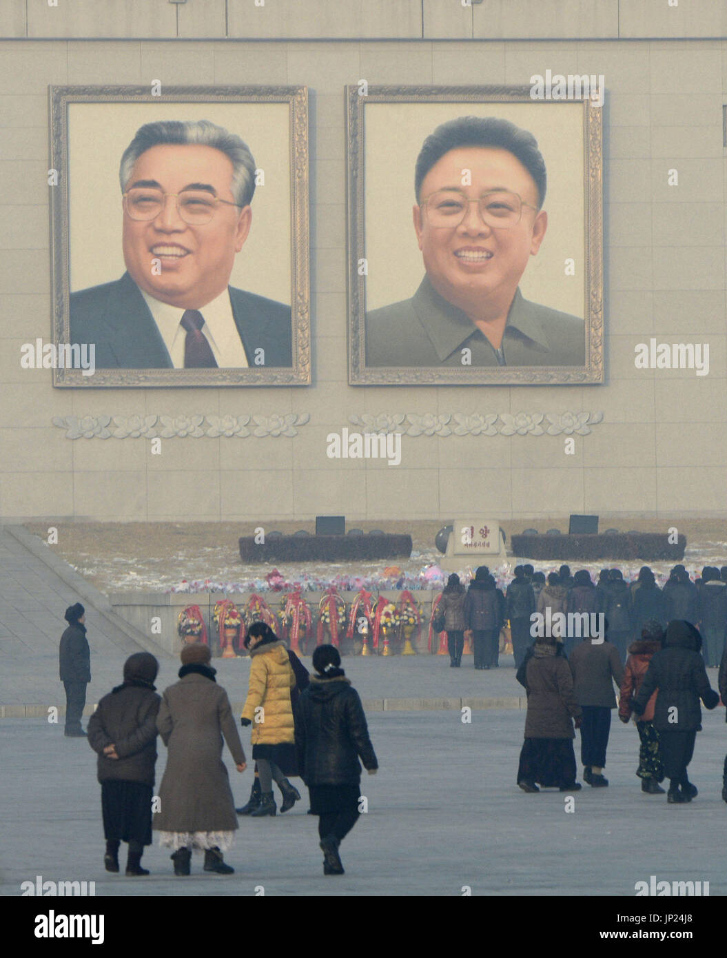 PYONGYANG, North Korea - North Koreans visit the portraits of national ...