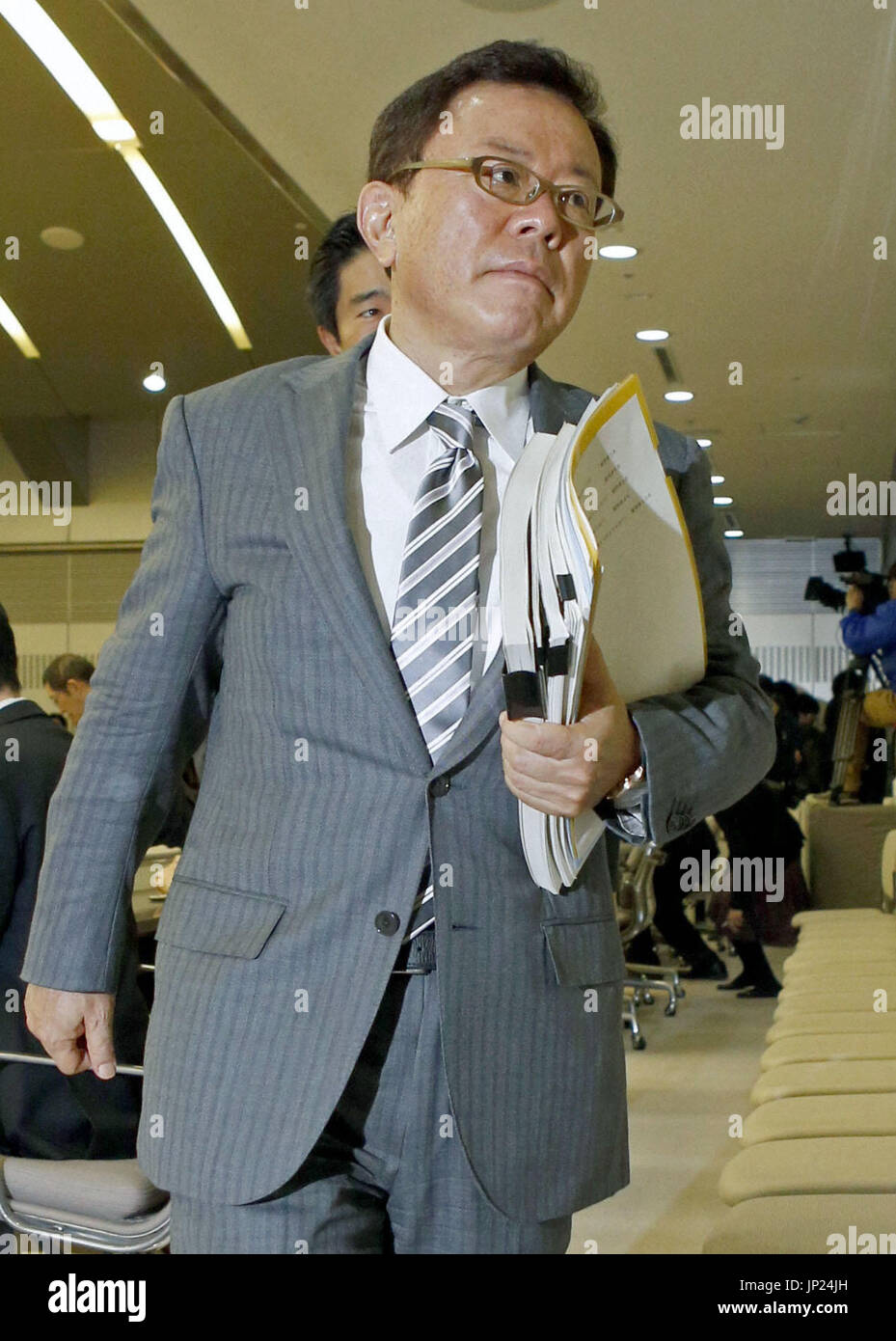 TOKYO, Japan - Tokyo Gov. Naoki Inose leaves the Tokyo Metropolitan ...