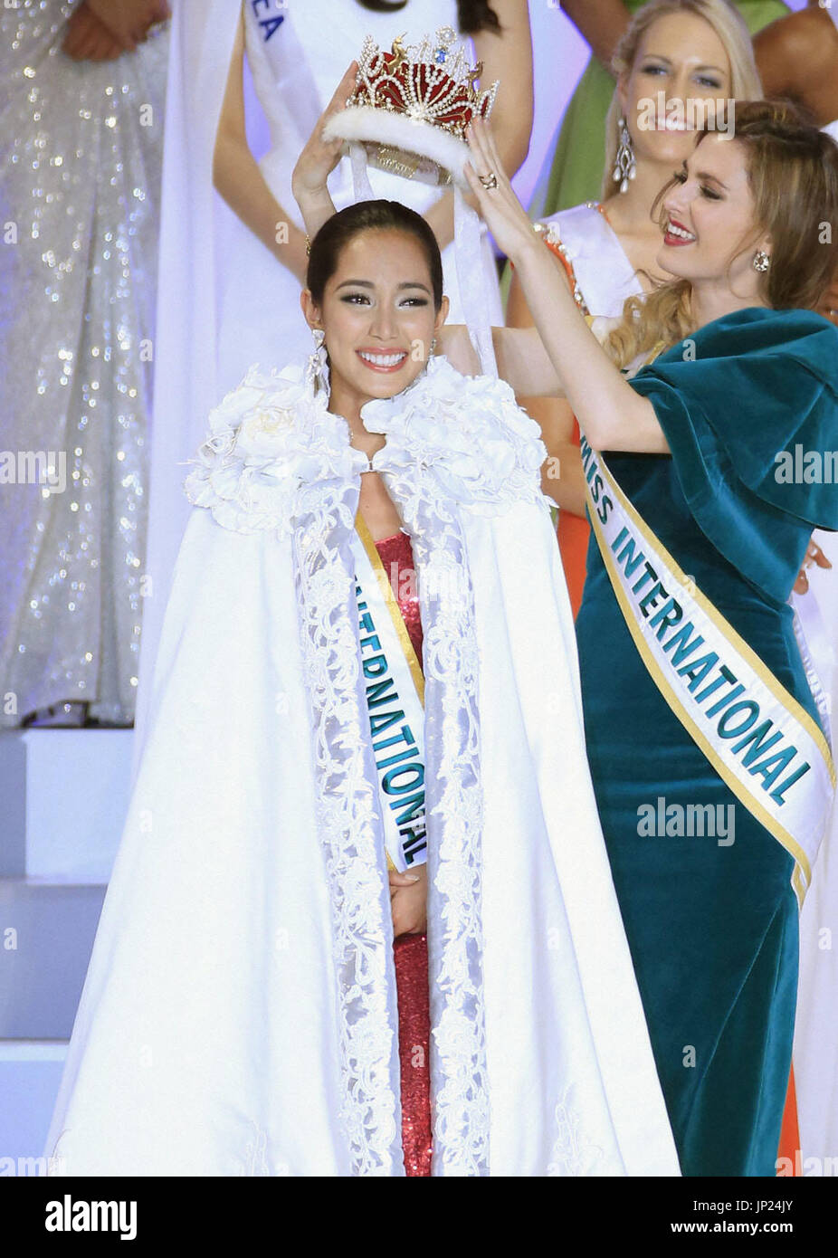 TOKYO, Japan - Bea Rose Santiago, from the Philippines, is crowned as ...