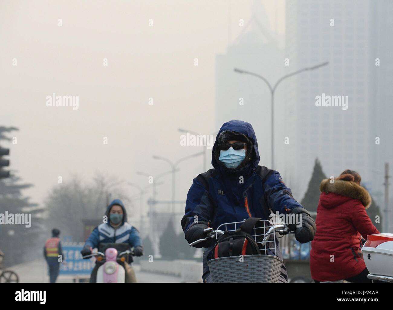 BEIJING, China - People wear masks due to air pollution in Beijing ...