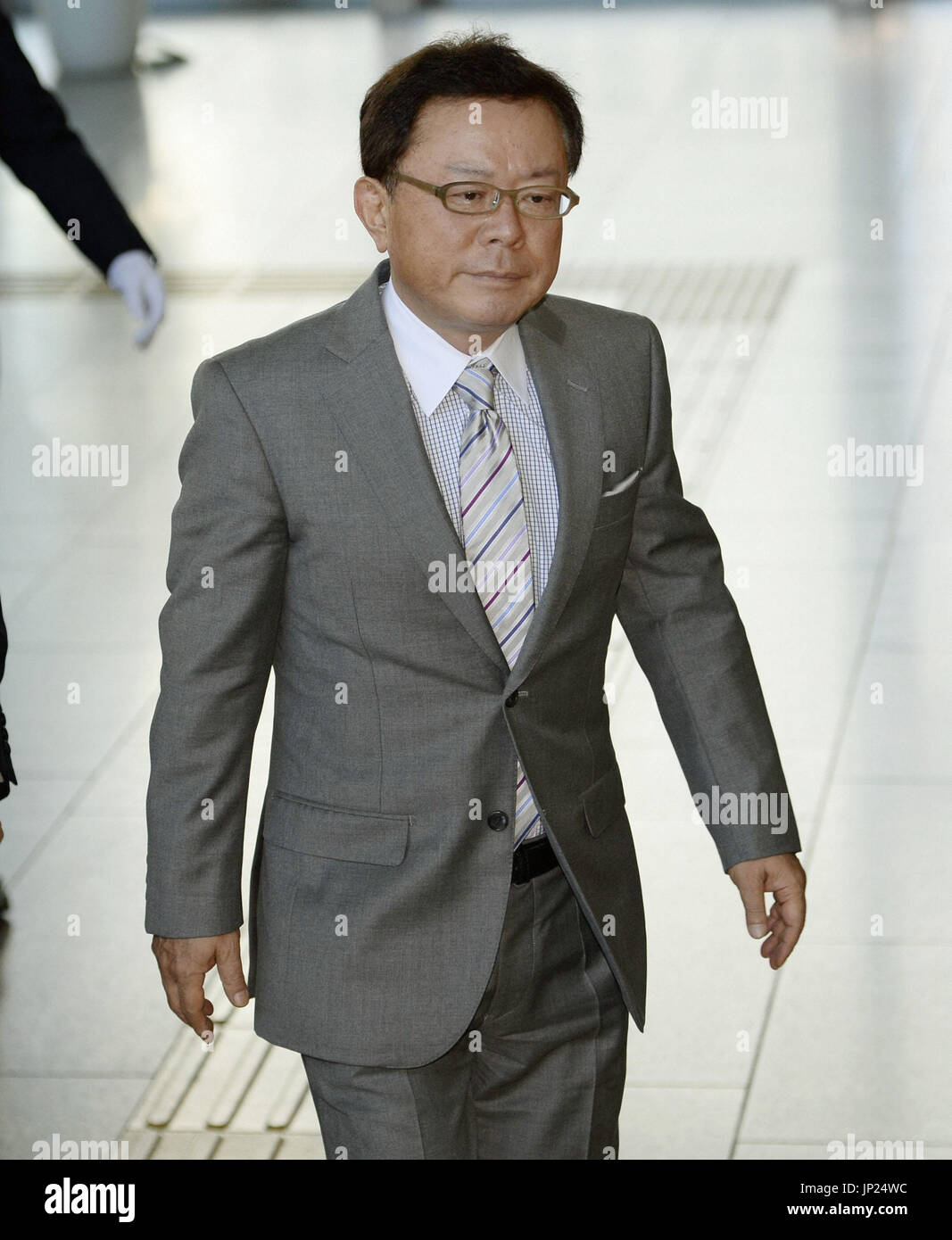 TOKYO, Japan - Tokyo Gov. Naoki Inose arrives at the Tokyo metropolitan ...