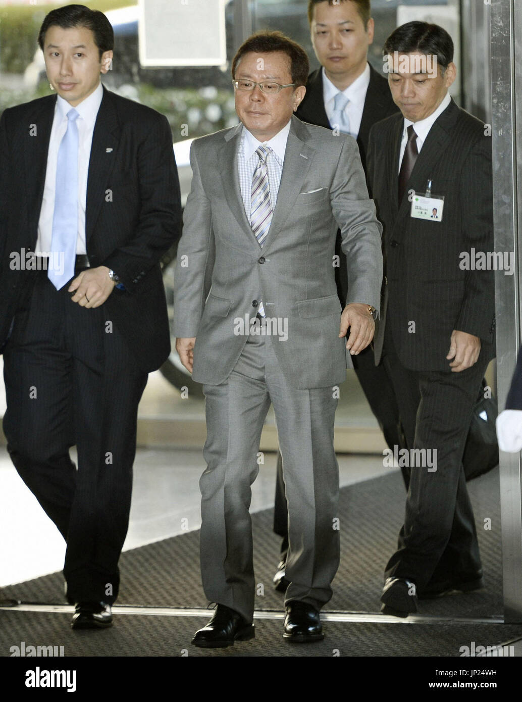 TOKYO, Japan - Tokyo Gov. Naoki Inose (C) arrives at the Tokyo ...