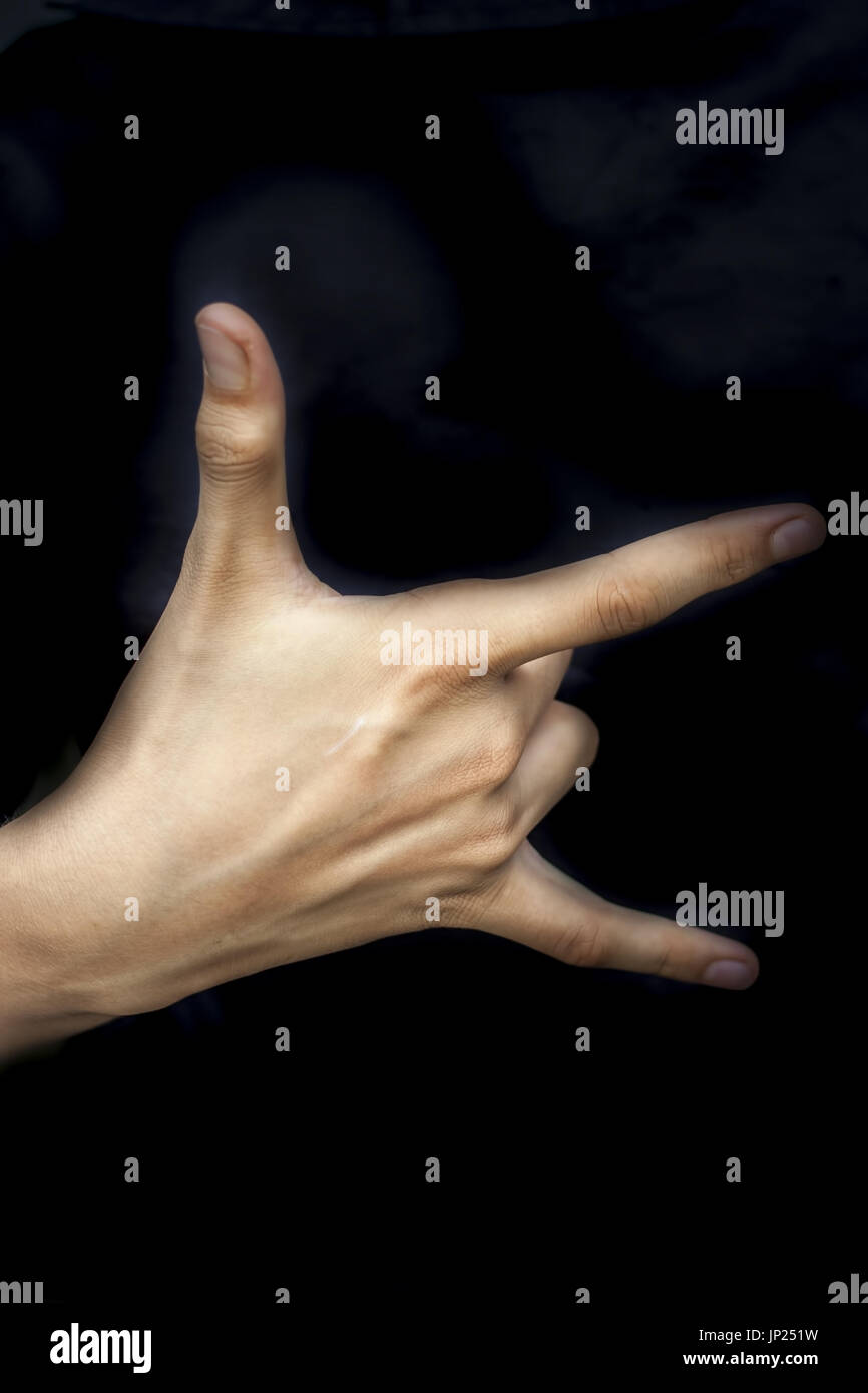 Human hand in symbolic gesture Stock Photo - Alamy