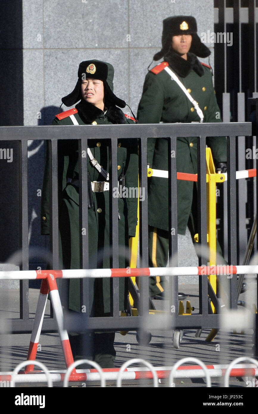 BEIJING, China - People's Armed Police officers stand guard in front of ...