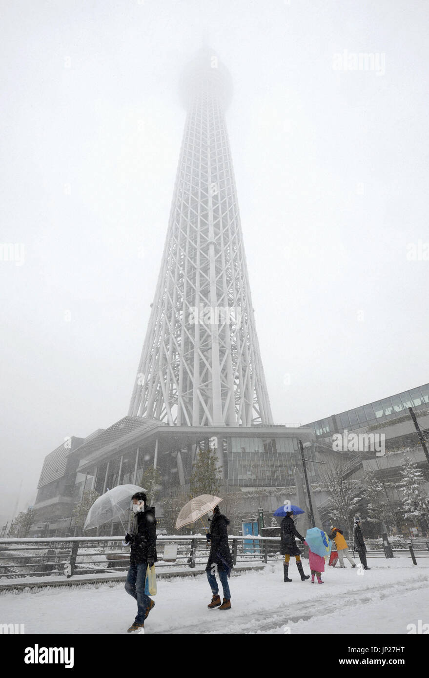 TOKYO, Japan - Heavy snow falls over the Tokyo Skytree broadcasting ...