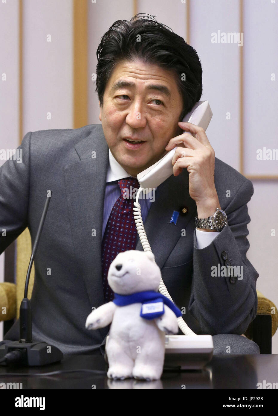 TOKYO, Japan - Japanese Prime Minister Shinzo Abe talks with Yuzuru Hanyu, the gold medalist in ...