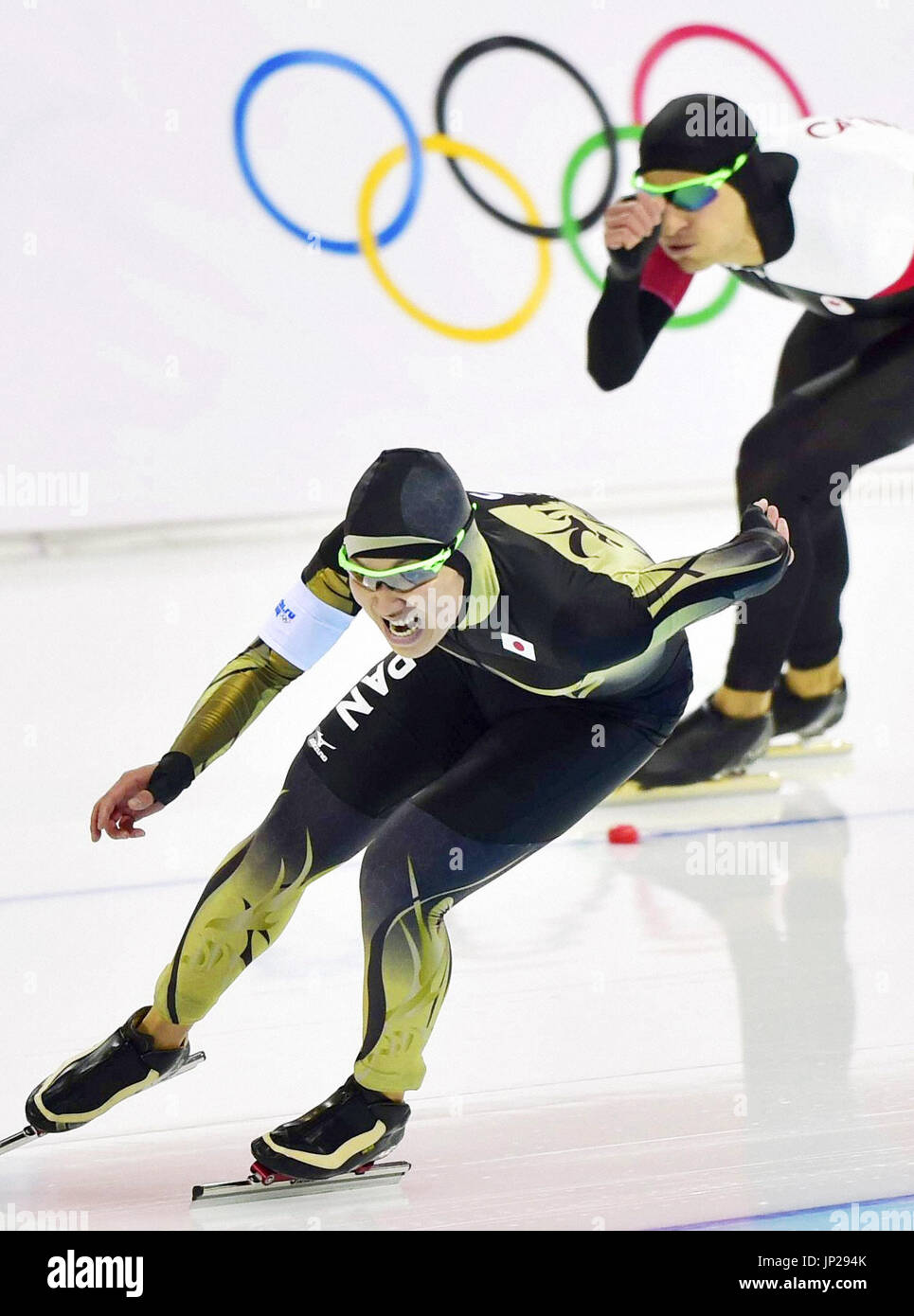SOCHI, Russia - Taro Kondo (front) of Japan skates with Canada's Lucas ...