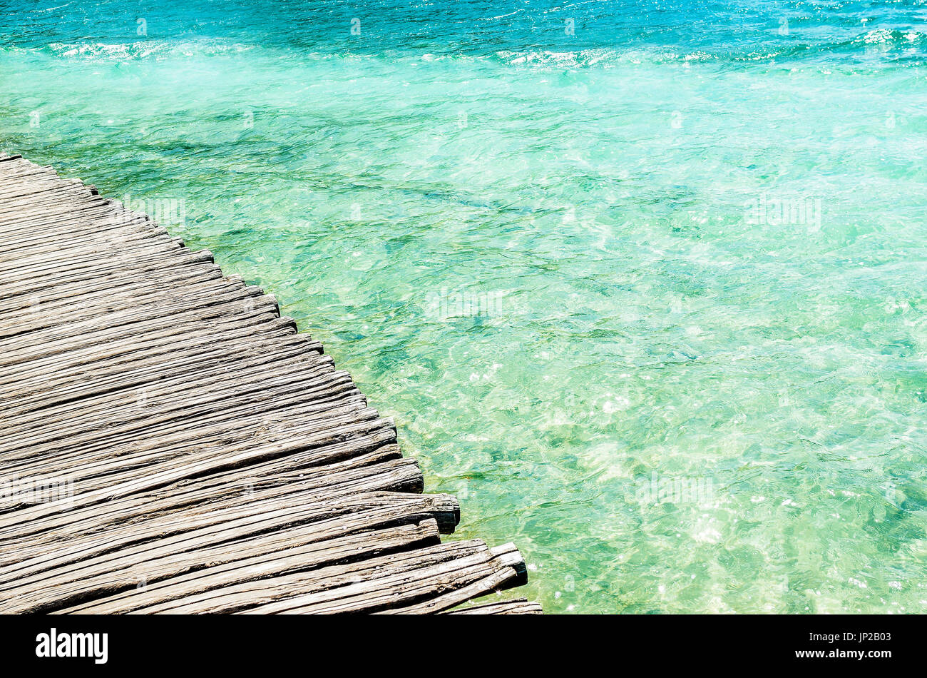 Wooden bridge over the water Stock Photo - Alamy