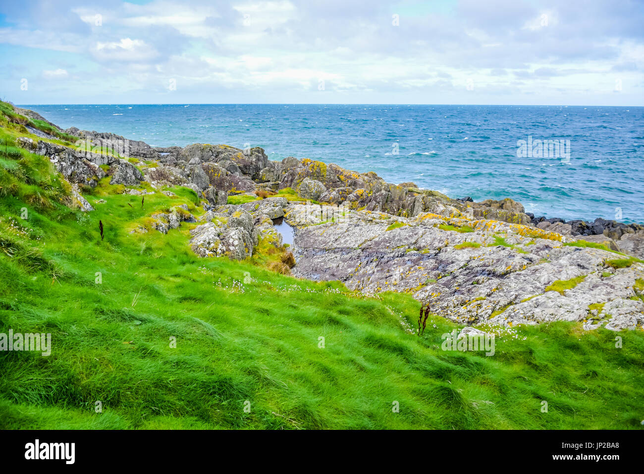 Landscape view of Peel hill rocky seashore, Isle of Man Stock Photo - Alamy