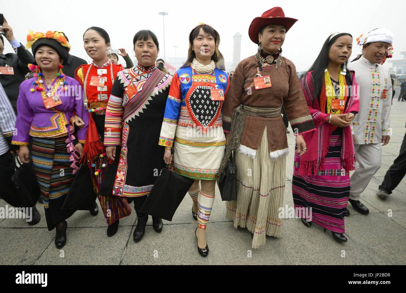 BEIJING, China - Ethnic minorities' representatives clad in traditional ...