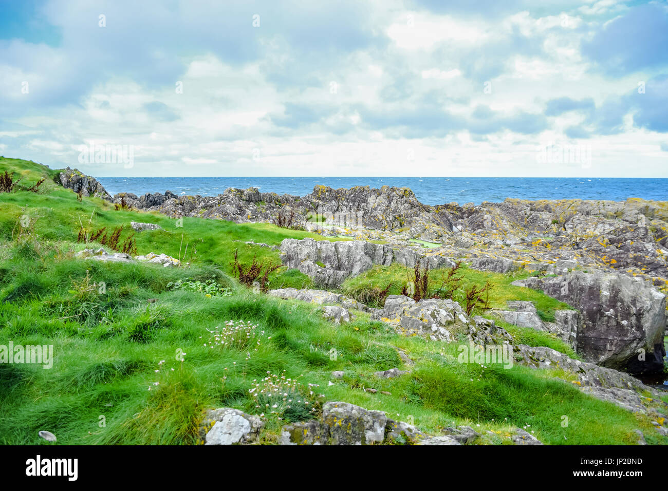 Landscape view of Peel hill rocky seashore, Isle of Man Stock Photo - Alamy