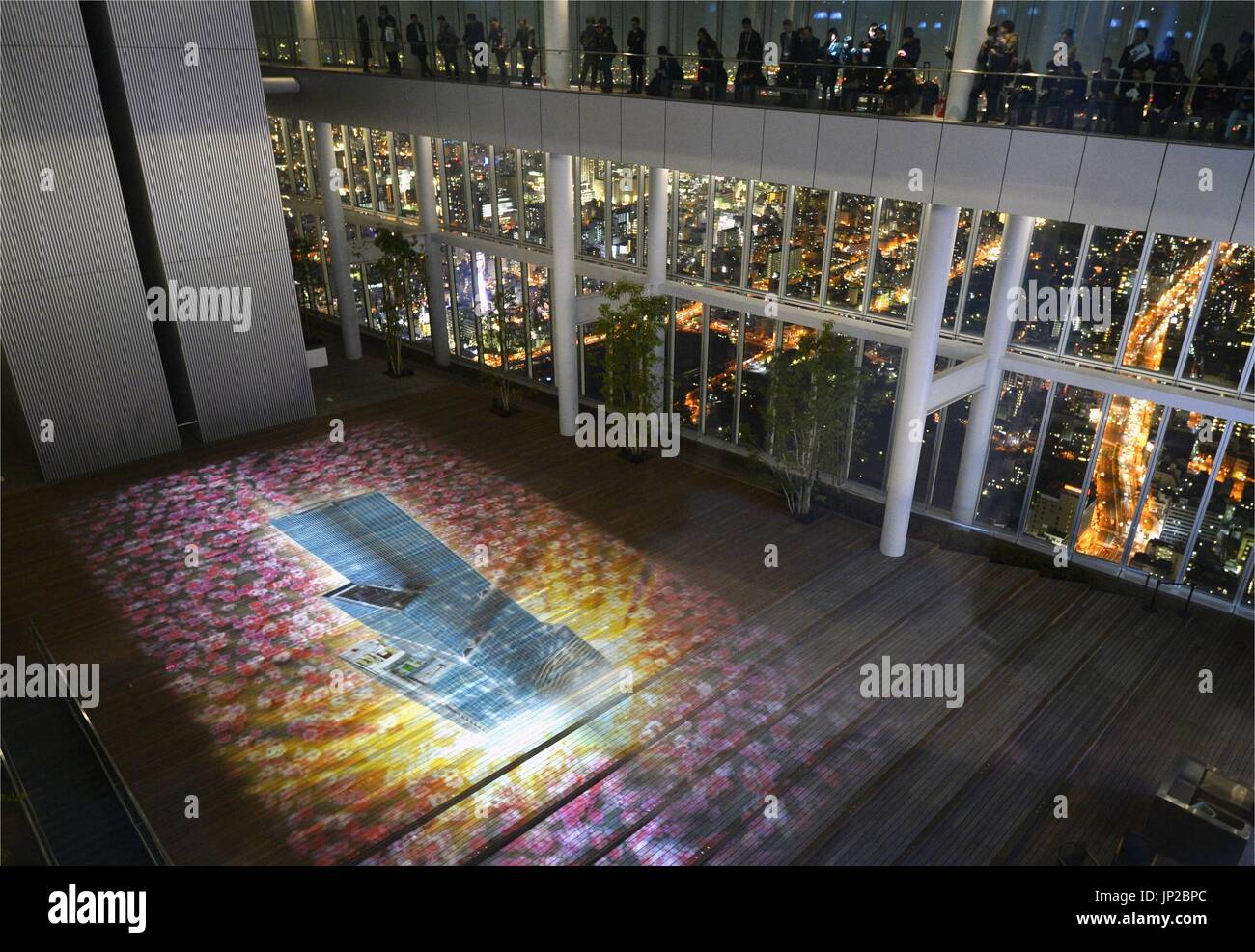 OSAKA, Japan - An image produced by lighting is projected on the deck ...