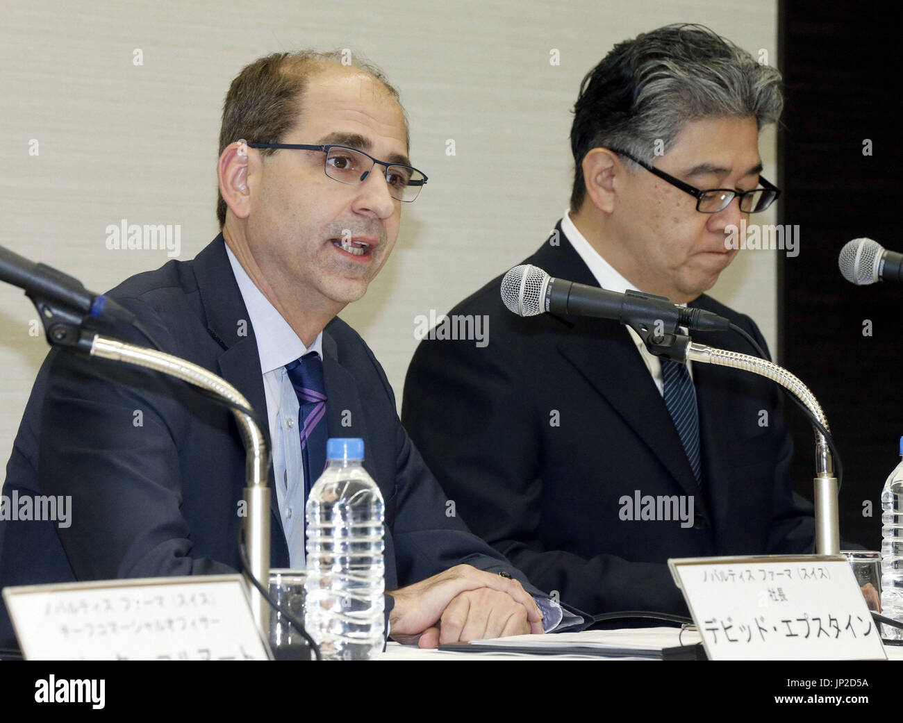 TOKYO, Japan - David Epstein (L), division head at Novartis AG, the ...