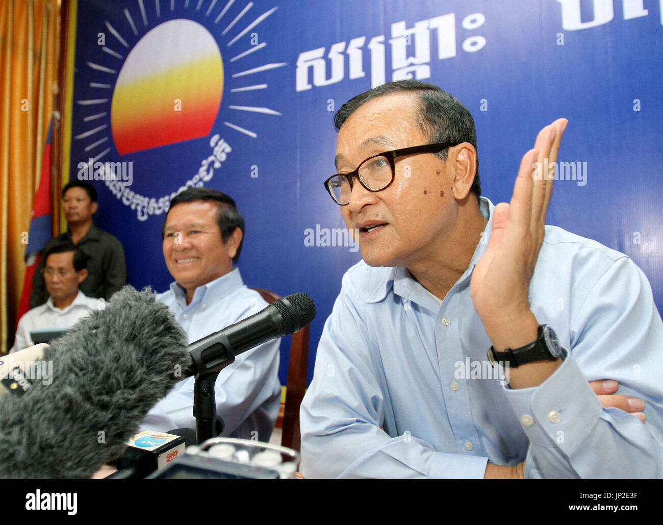 PHNOM PENH, Cambodia - Sam Rainsy (R), leader of the opposition ...