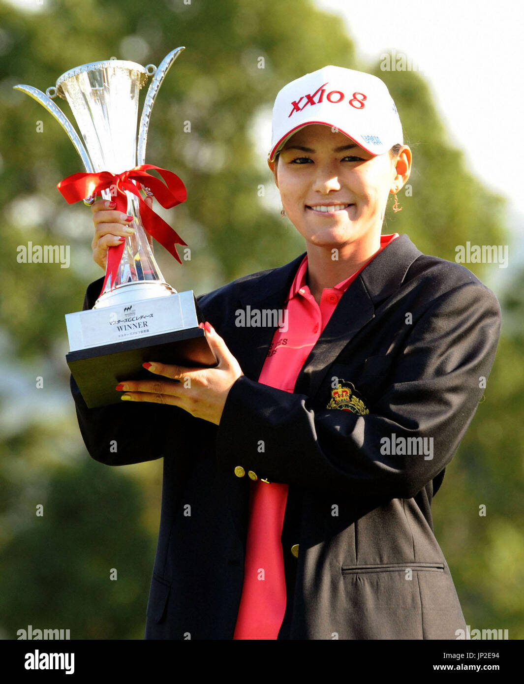 MIKI, Japan - Japan's Sakura Yokomine holds the victor's trophy after ...