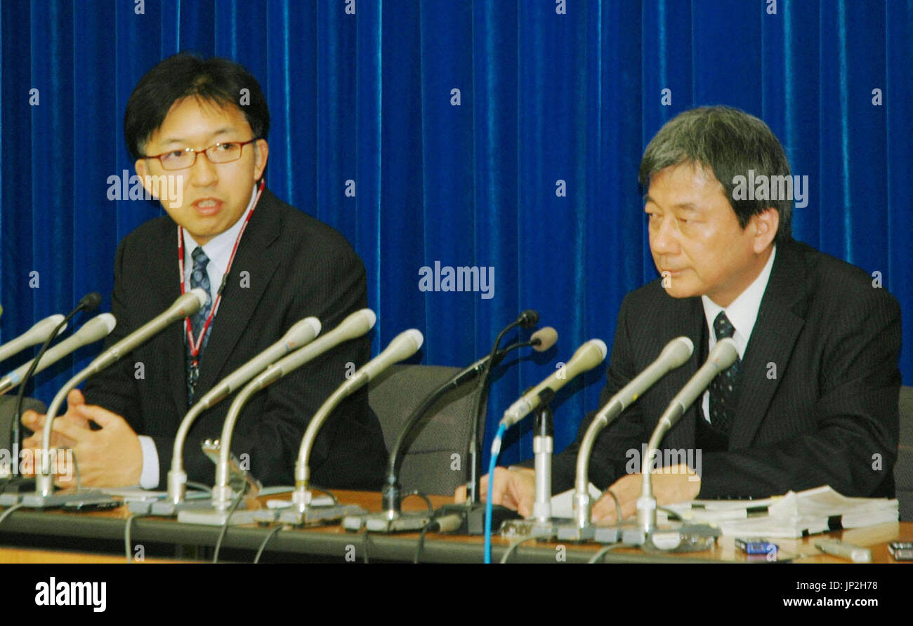 TOKYO, Japan - Health, Labor and Welfare Ministry officials hold a ...
