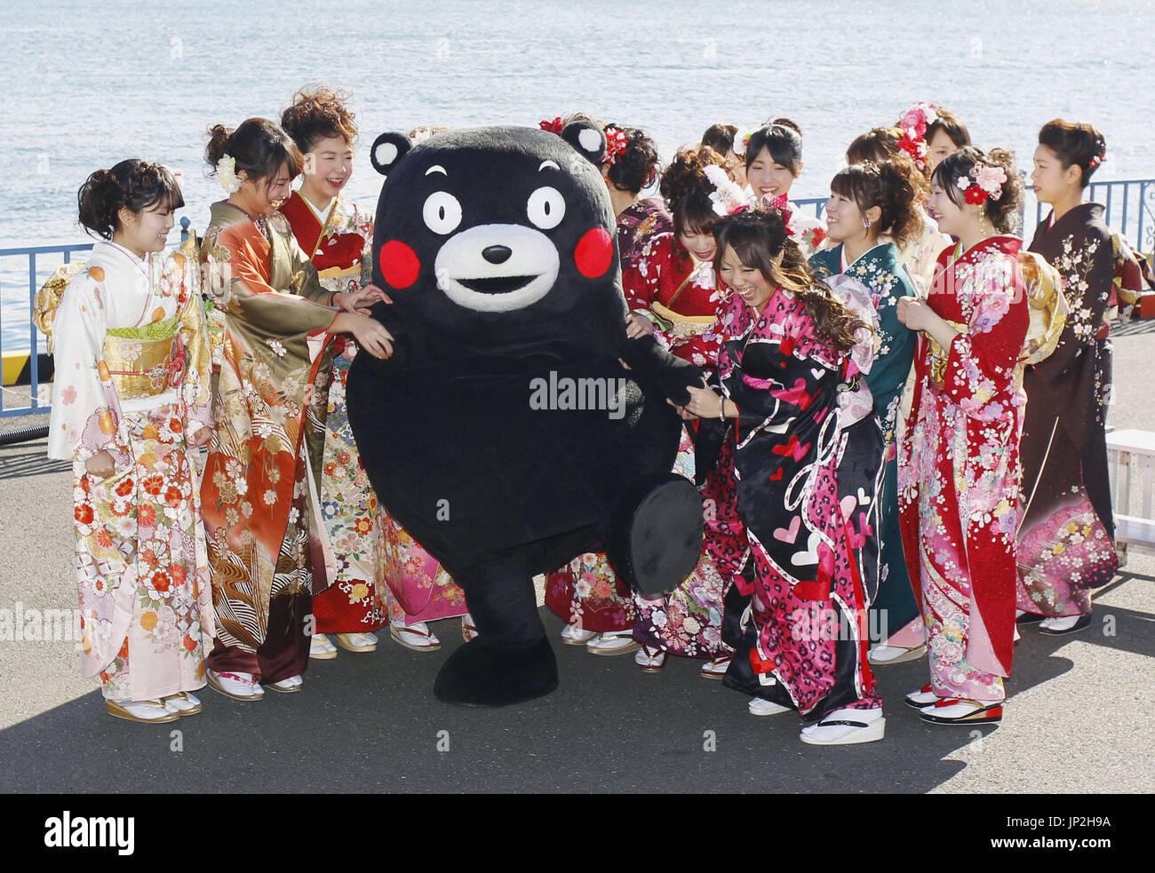 TOKYO, Japan - Kumamon (C), a popular black bear mascot for Japan's ...