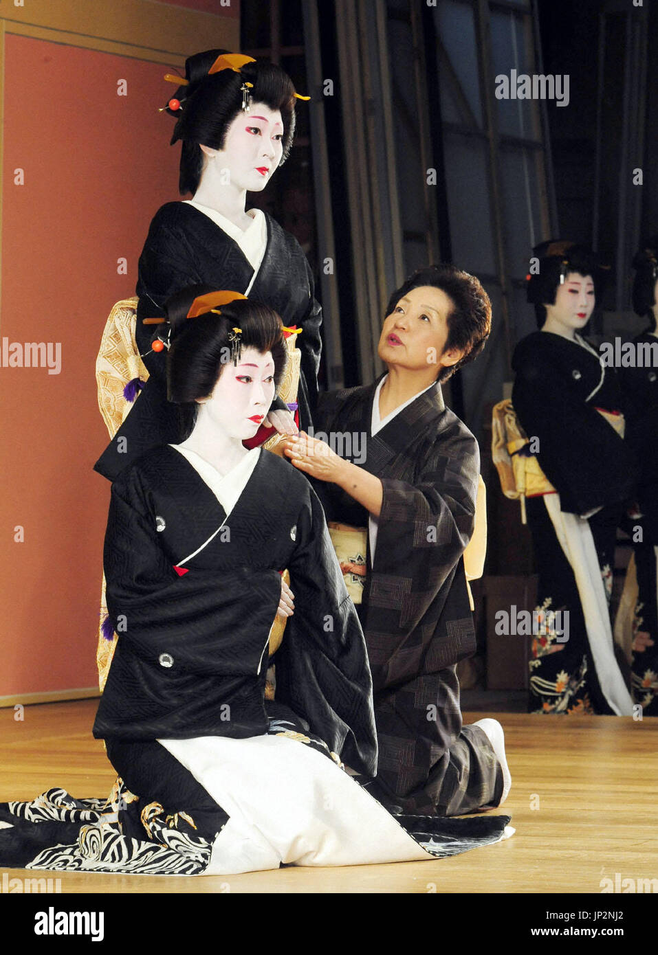 KYOTO, Japan - Geisha pose for photos in Kyoto on Feb. 19, 2014, during ...