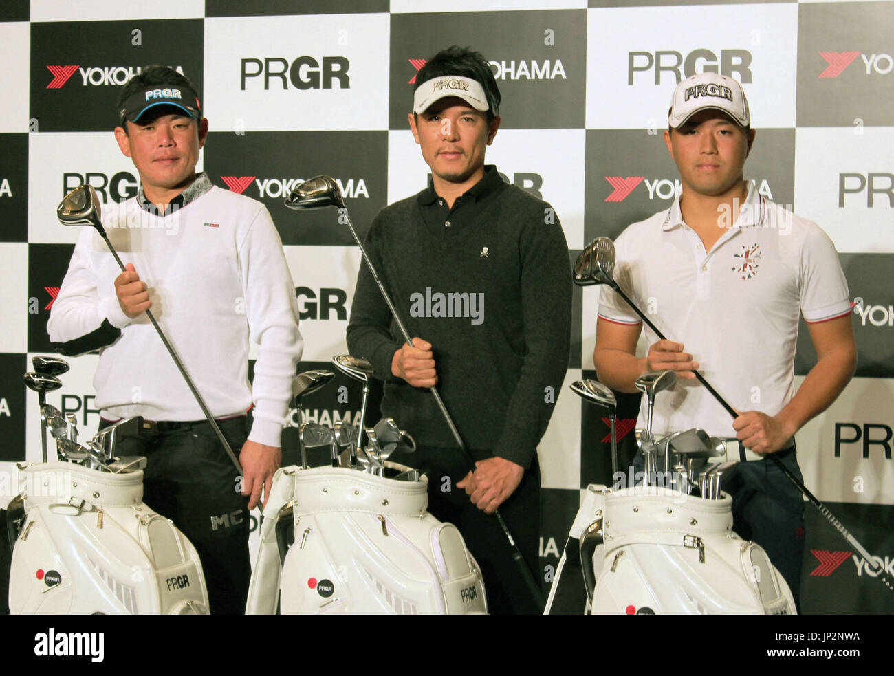 TOKYO, Japan - Japanese professional golfers (from L to R) Tetsuji ...