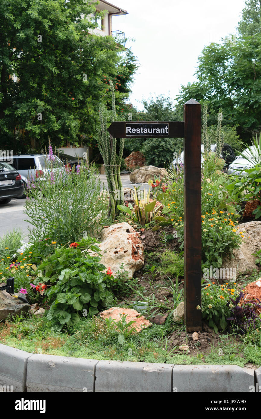 restaurant sign indicator pointing to the left. outdoors indicator ...