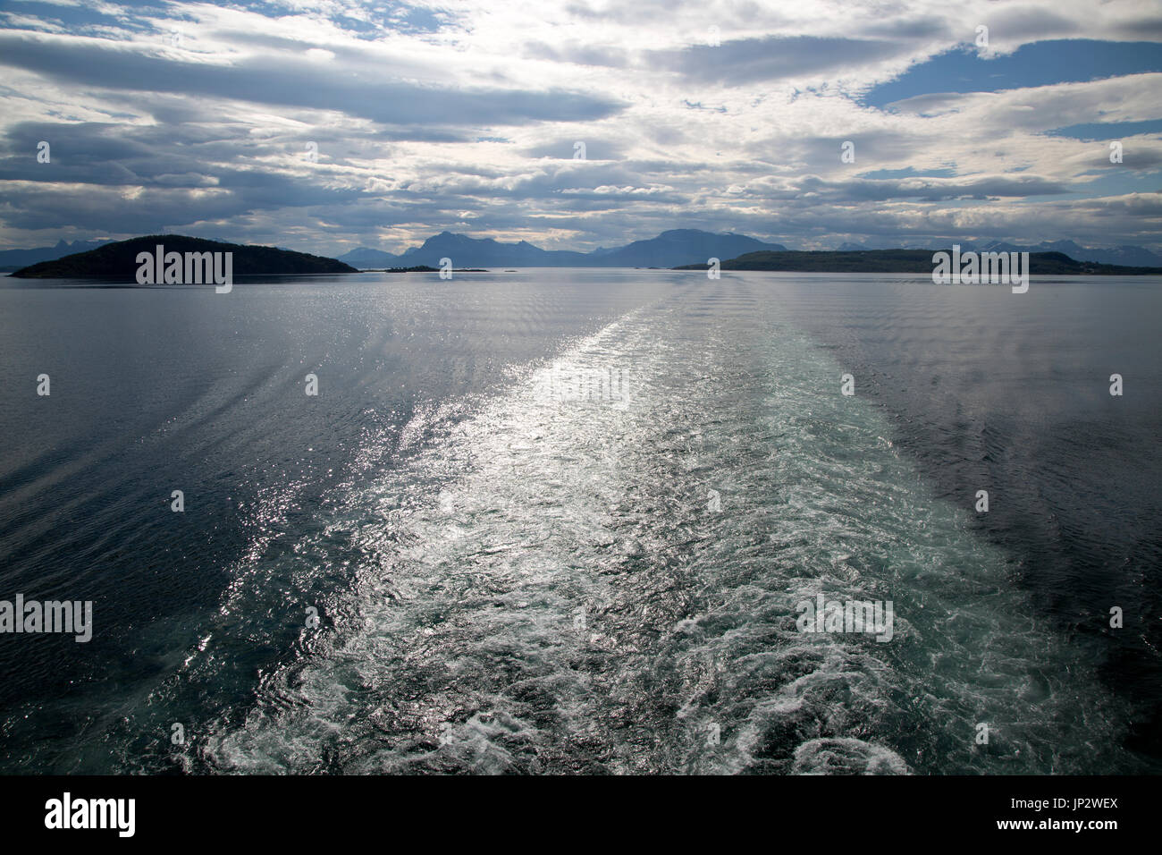 Ship's wake of Hurtigruten ferry sea between Harstad and Stokmarknes ...