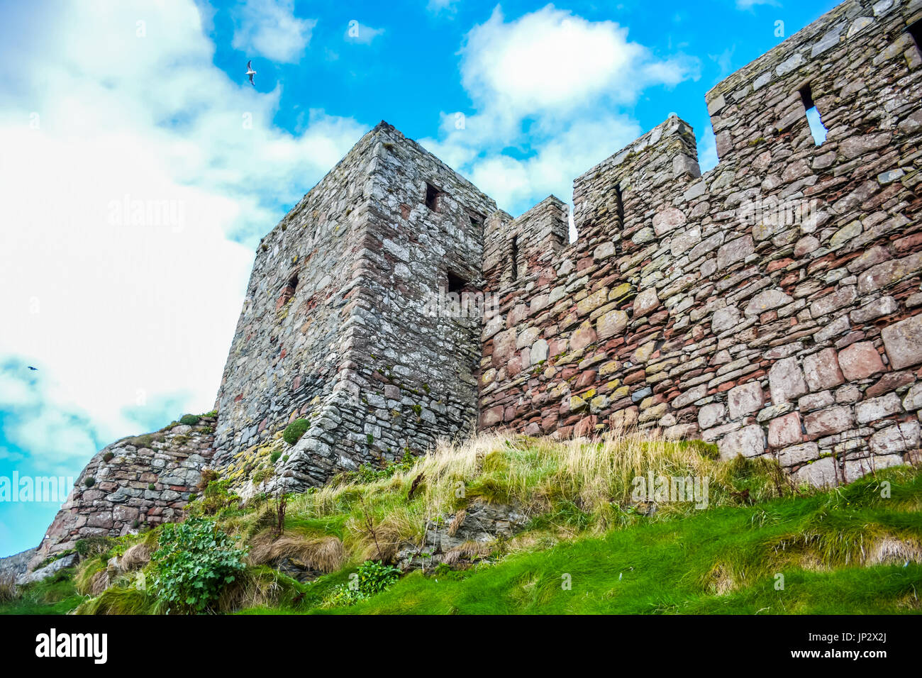 Great stone wall of Peel Castle constructed by viking in city of Peel ...
