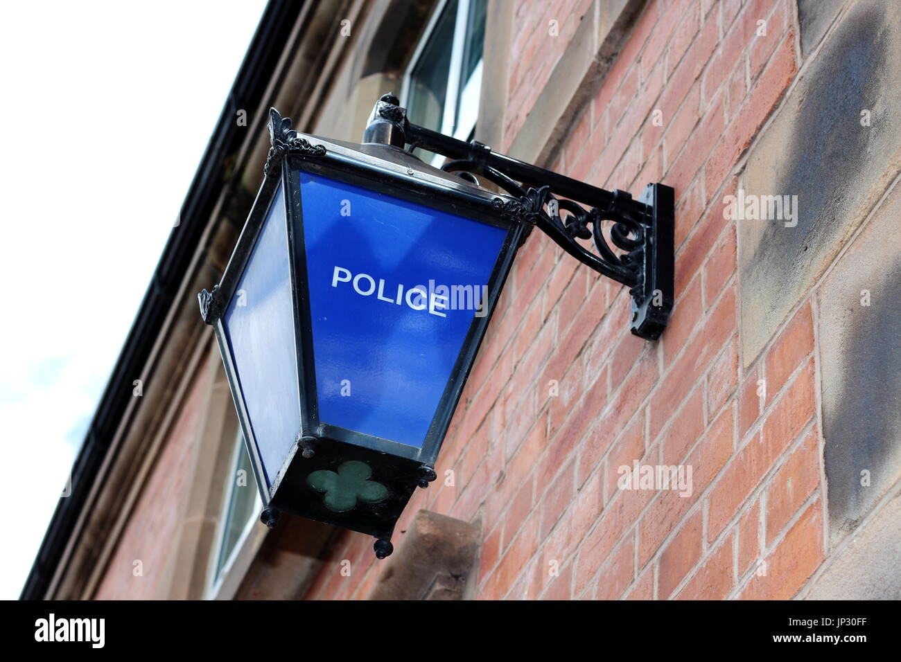 Traditional style police lantern outside police station Stock Photo - Alamy