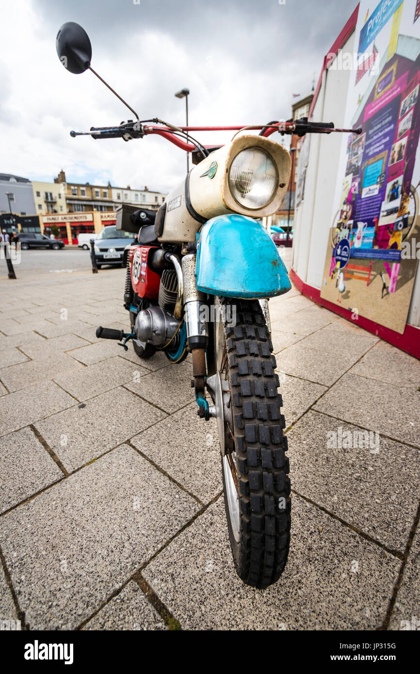 Vintage East German bike, made by OMZ. Parked on pavement. Low angle ...