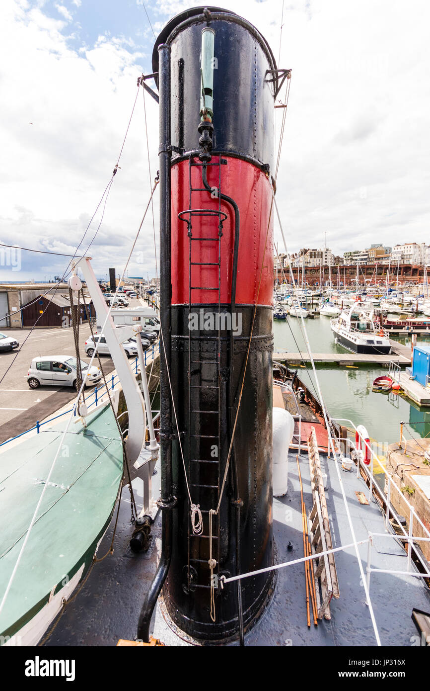 The smoke stack, funnel, of the 1940s steam tug, Cervia, moored at ...