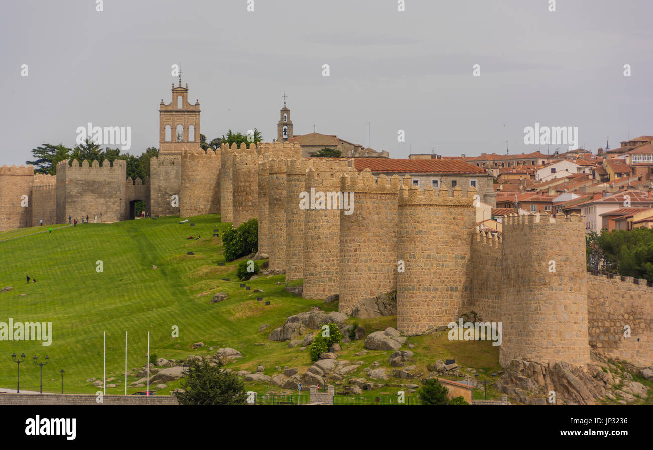 Walls of the historic city of Avila,at the blue hour, in Spain. the old ...