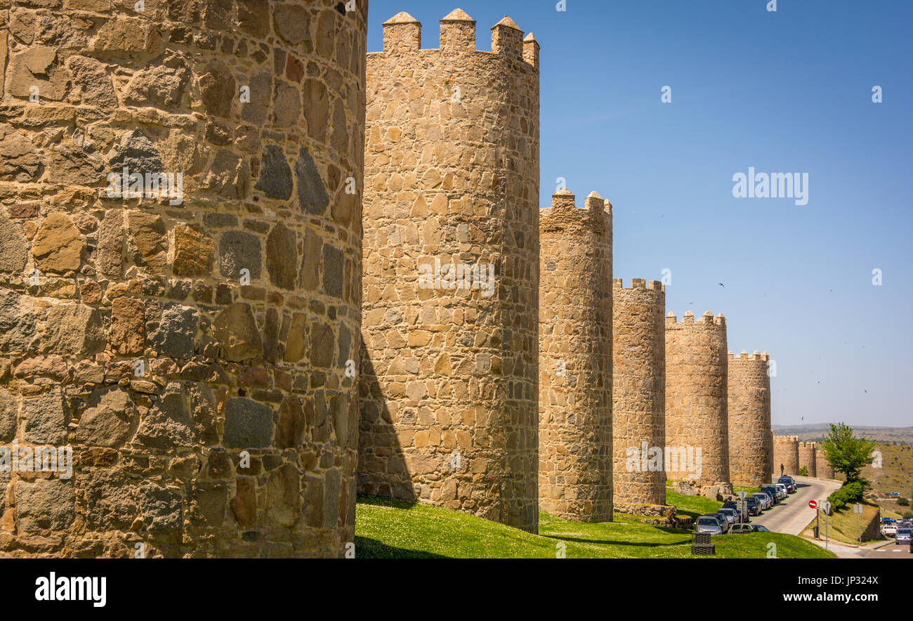 Walls of the historic city of Avila,at the blue hour, in Spain. the old ...