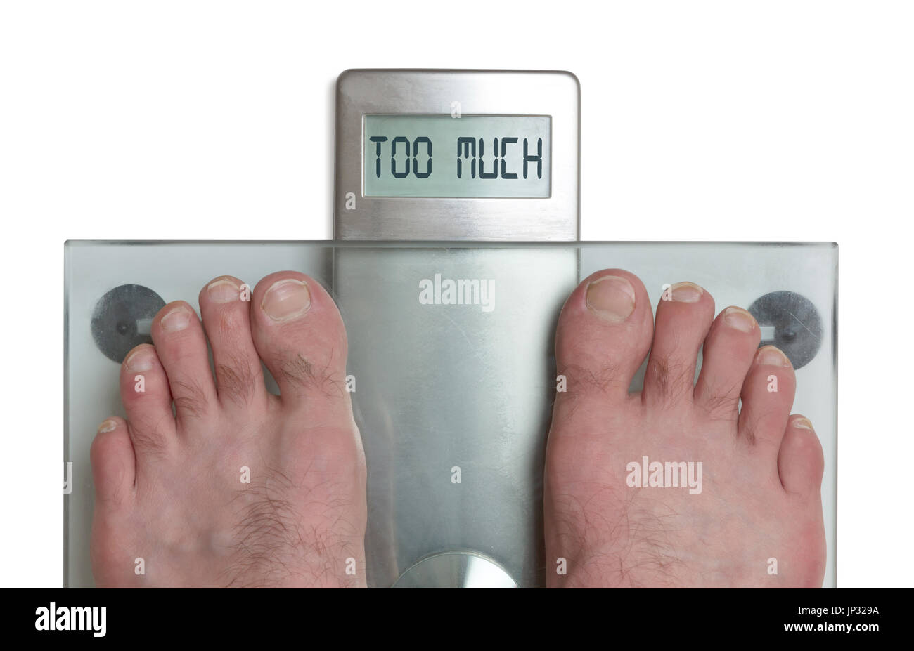 Closeup of man's feet on weight scale - Too much Stock Photo - Alamy