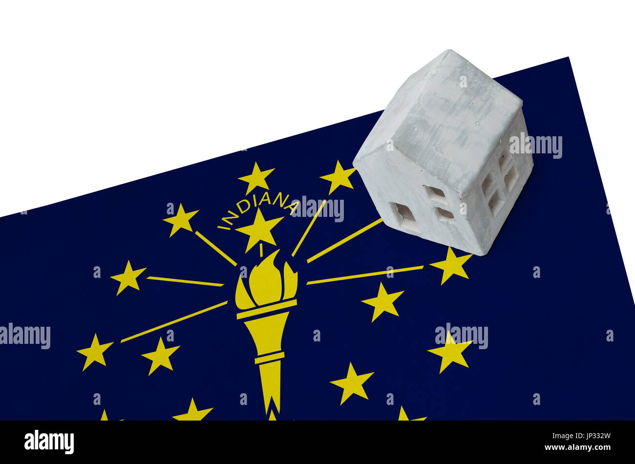 Small house on a flag - Living or migrating to Indiana Stock Photo - Alamy
