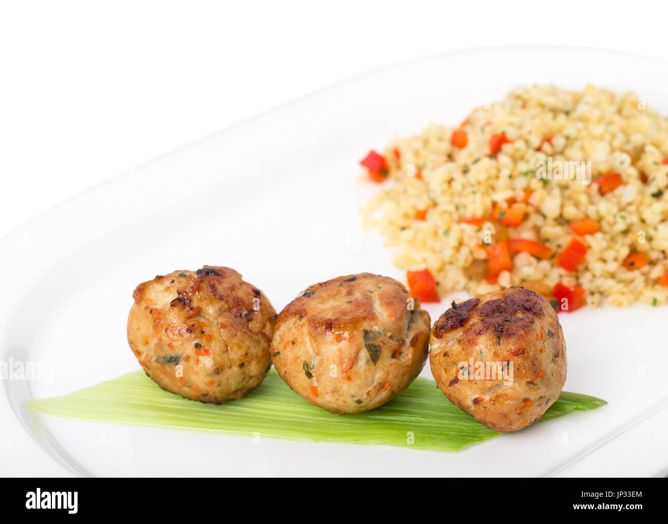 Turkey meatballs with delicious bulgur. Macro. Isolated on a white ...