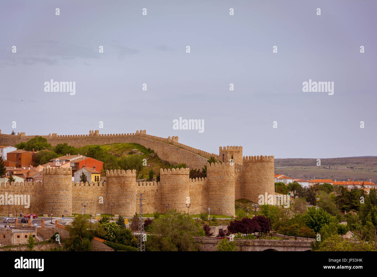 Walls of the historic city of Avila,at the blue hour, in Spain. the old ...
