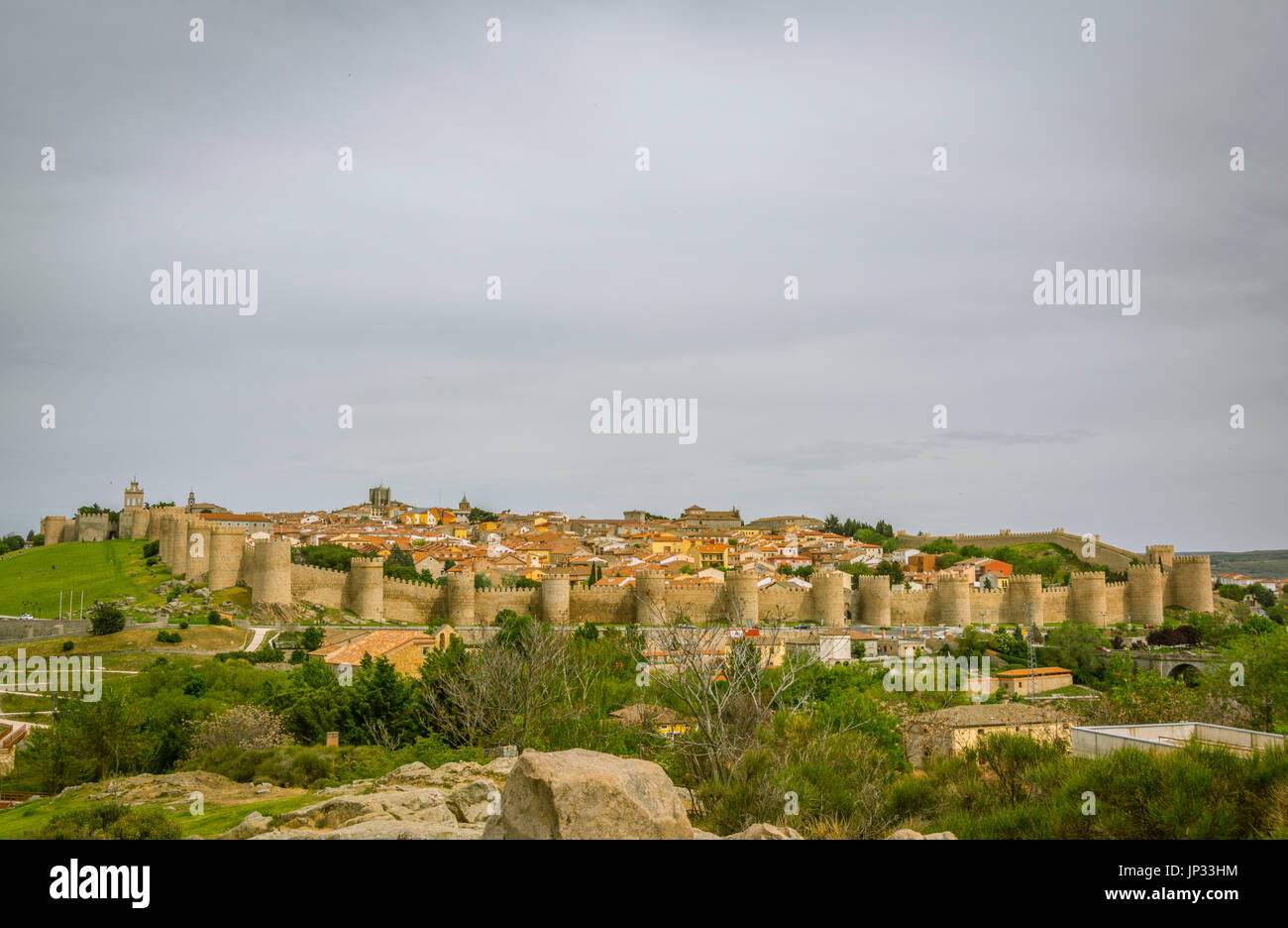 Walls of the historic city of Avila,at the blue hour, in Spain. the old ...