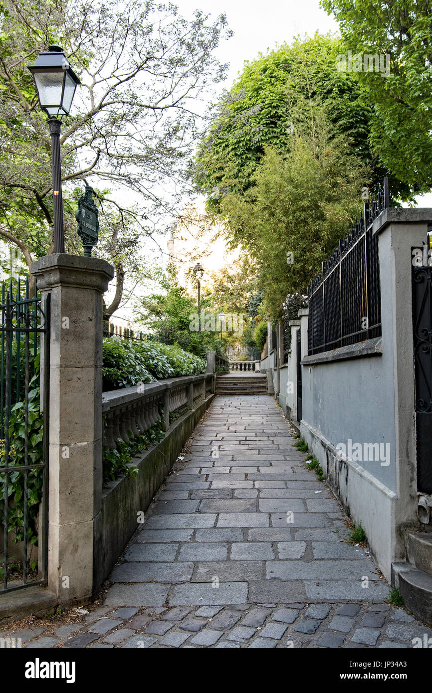 A narrow alley in the morning Stock Photo - Alamy