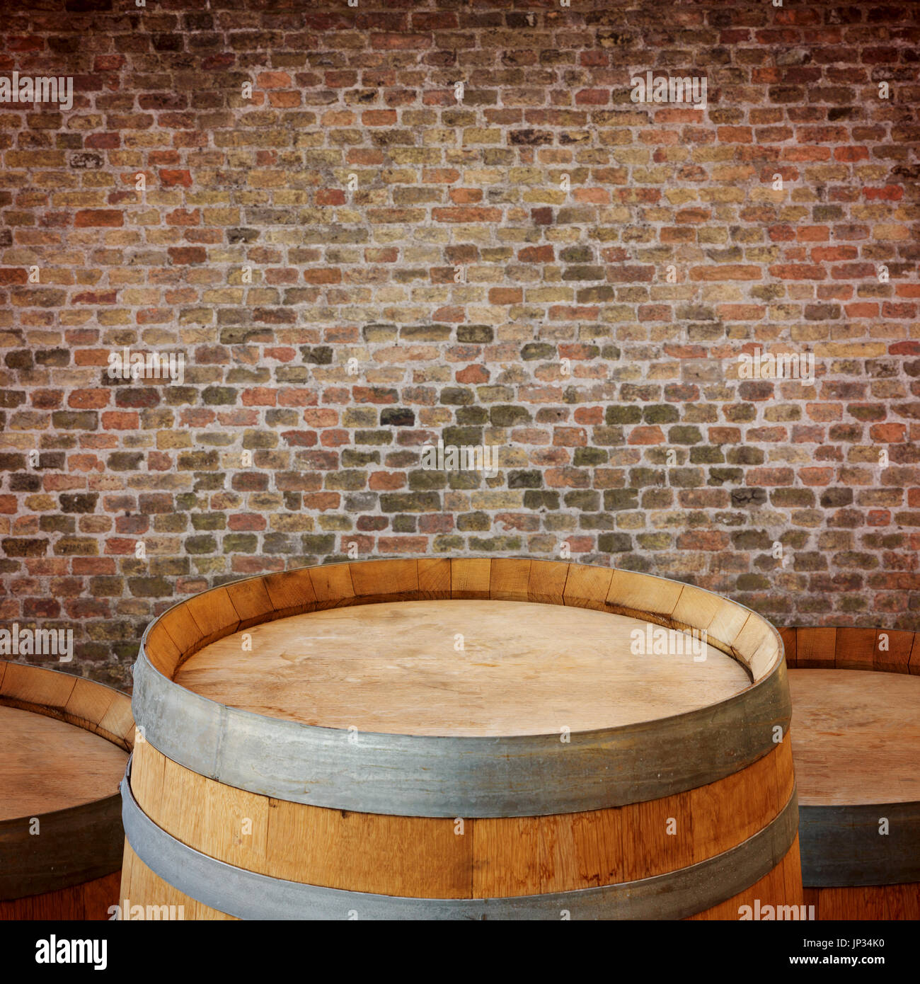 Wooden wine barrel over brick walll background. Oktoberfest concept ...